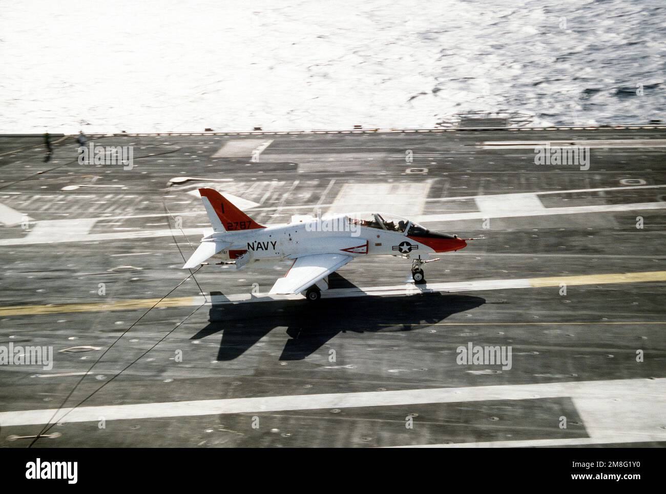 A T-45A Goshawk trainer aircraft lands on the flight deck of the ...
