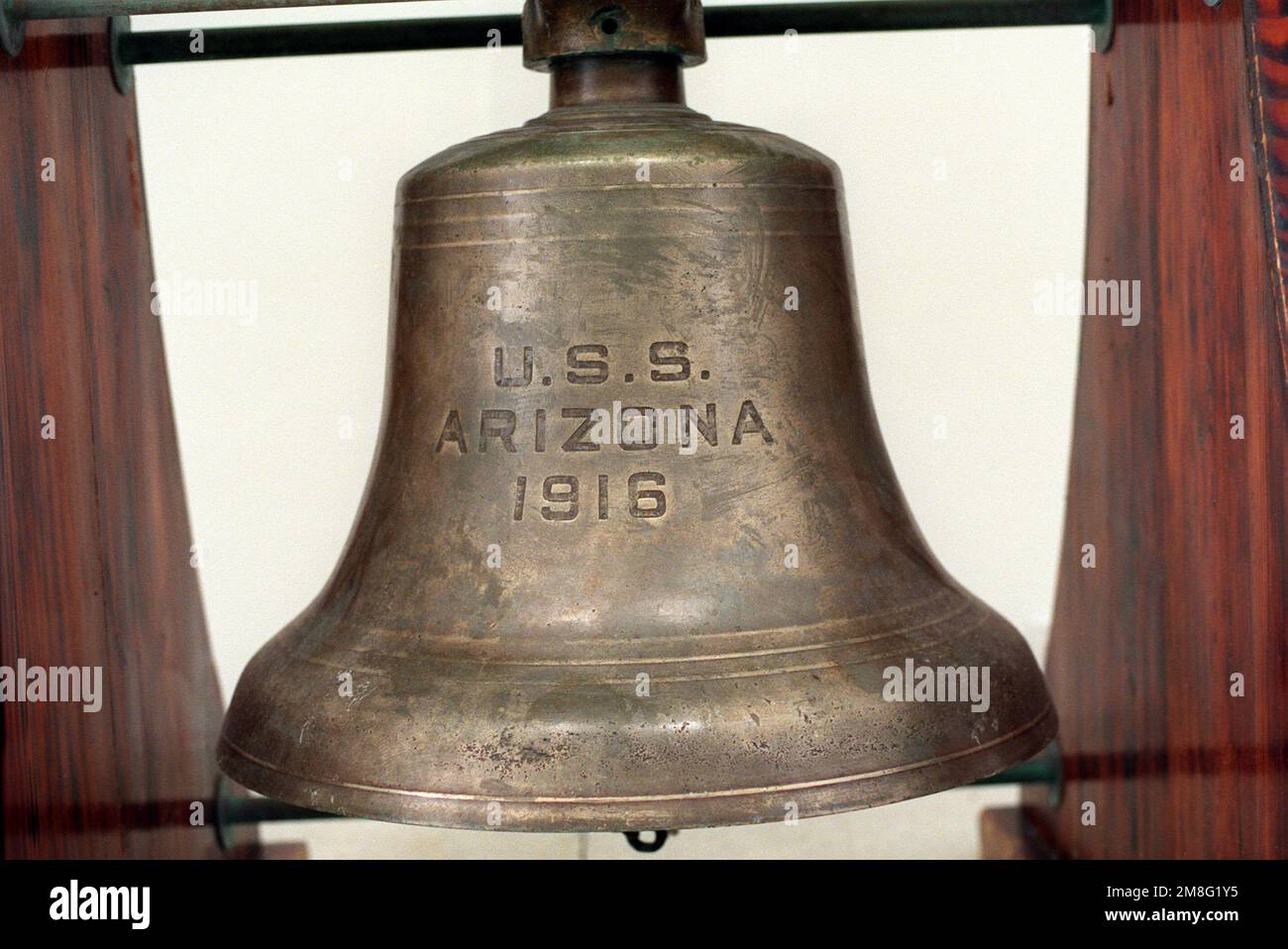 The bell of the USS ARIZONA on display at the USS ARIZONA memorial ...