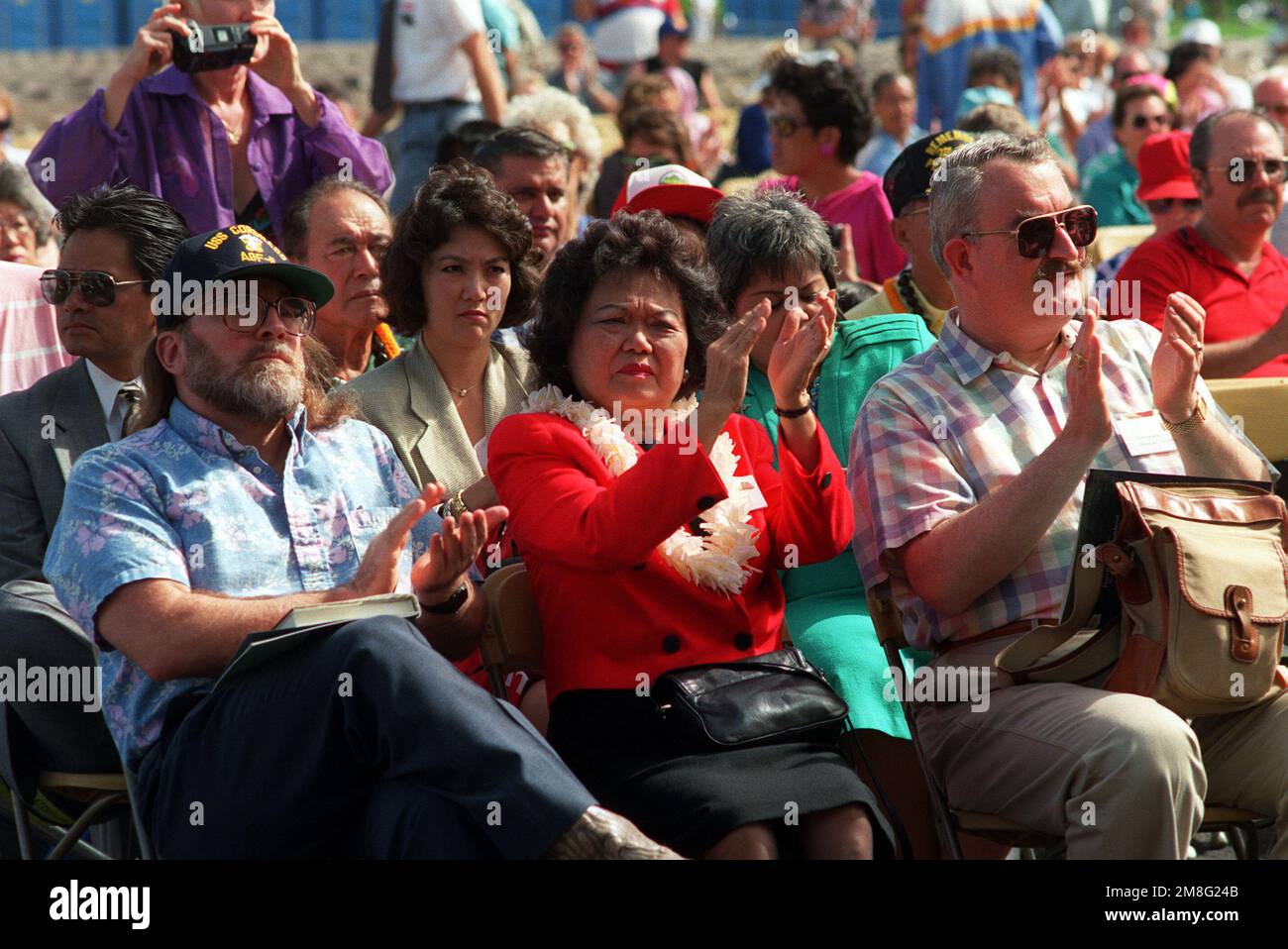 Rep. Patsy Mink and the audience applaud during Remembrance Day ...