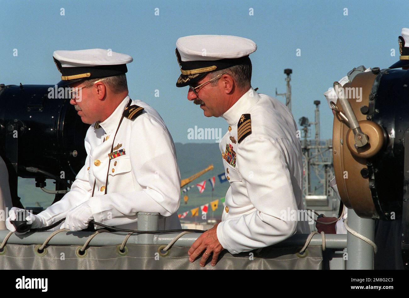 The commanding officer of the guided missile cruiser USS CHOSIN (CG-65 ...