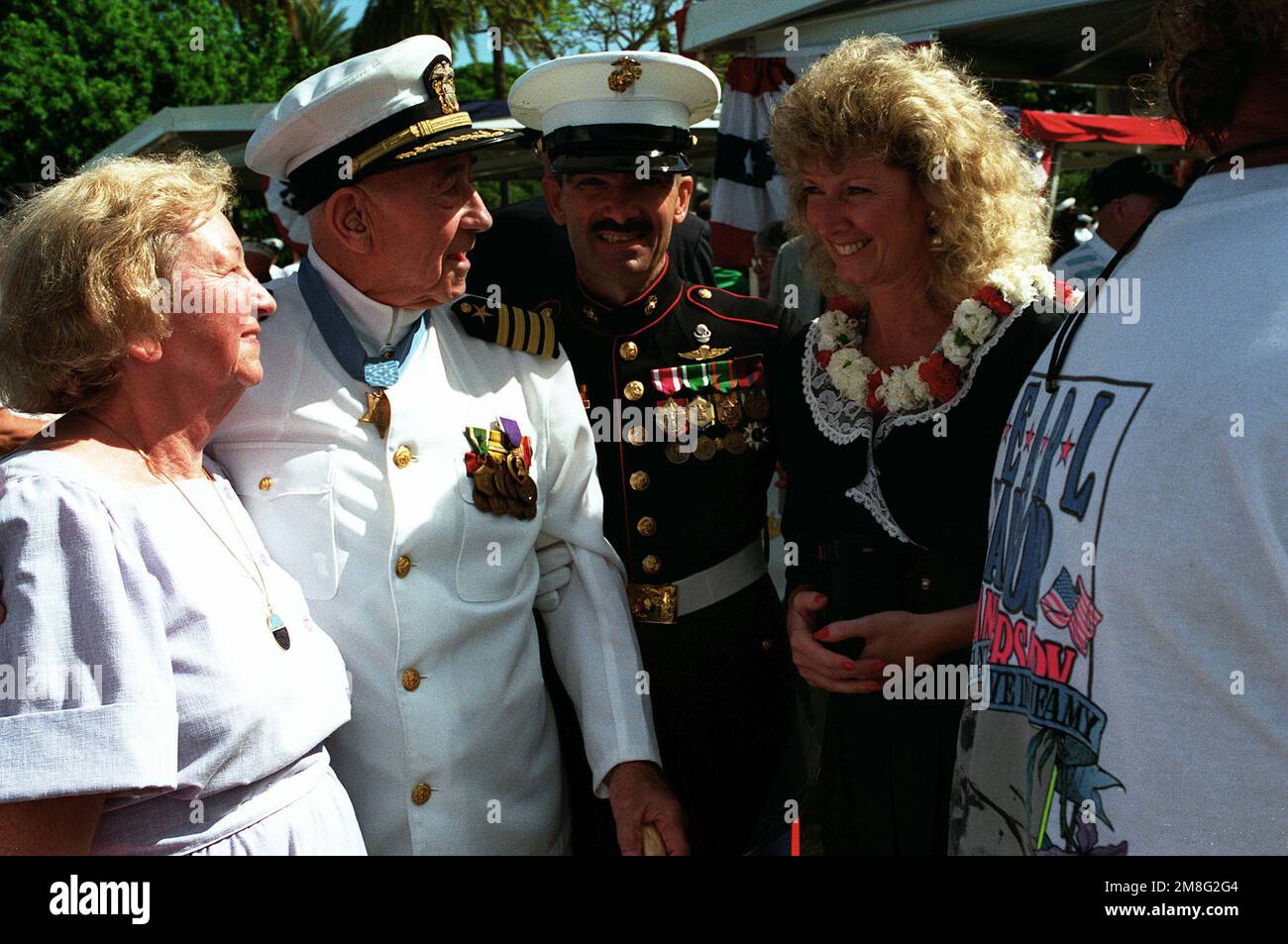 CAPT. Donald K. Ross, USN (Ret.) and Mrs. Ross converse with MASTER SGT ...