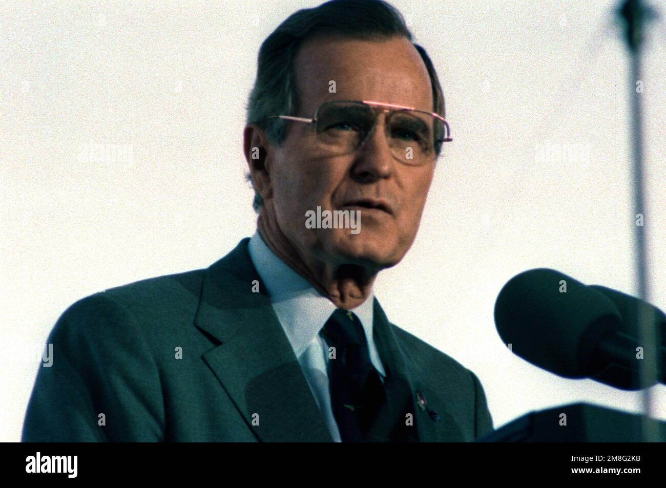 President George Bush speaks from the Kilo 8 Pier during the observance ...