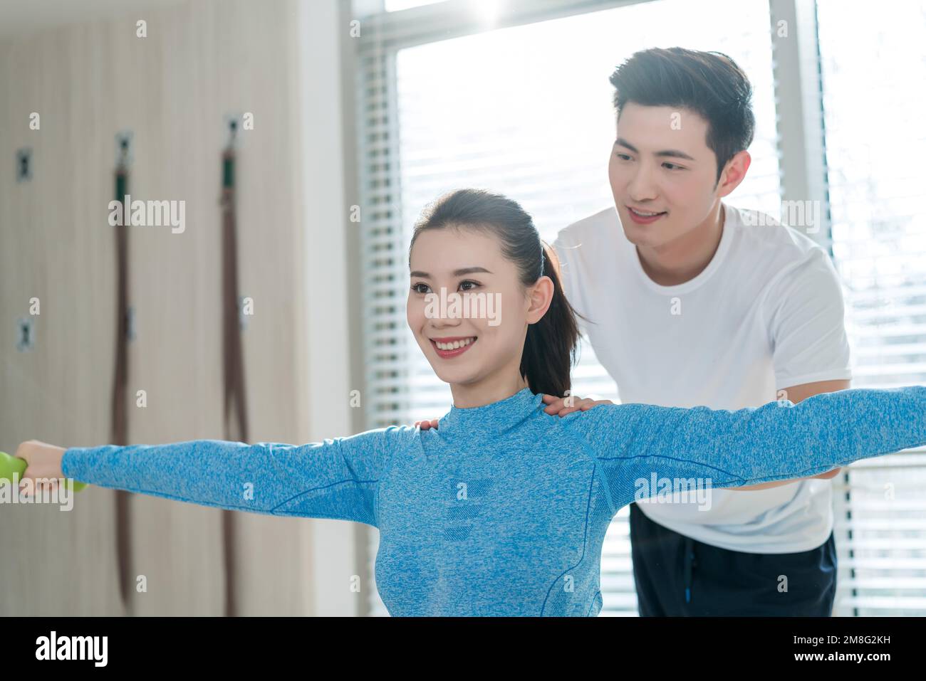 A young woman in private teaching under the guidance of fitness Stock ...