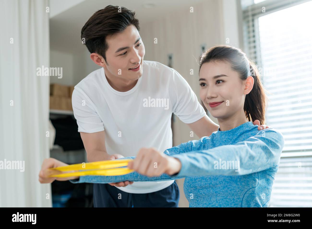 A young woman in private teaching under the guidance of fitness Stock ...