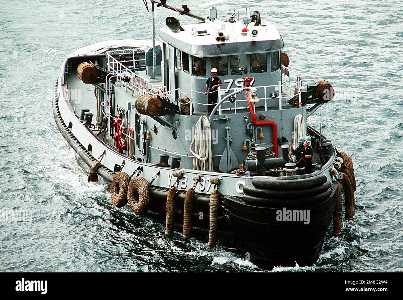 A starboard bow view of the large harbor tug TAMAQUA (YTB-797 ...