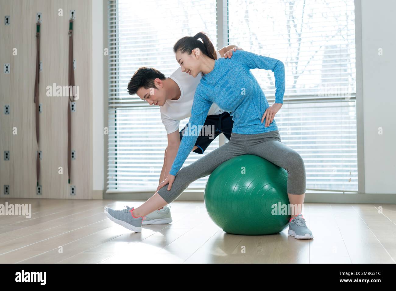 A young woman in private teaching under the guidance of fitness Stock ...