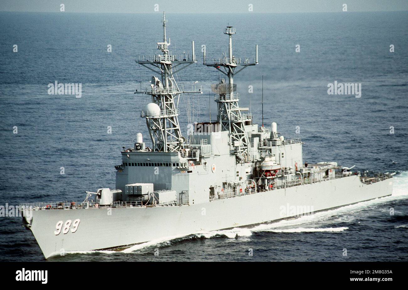 A port bow view of the destroyer USS DEYO (DD-989) underway south of ...
