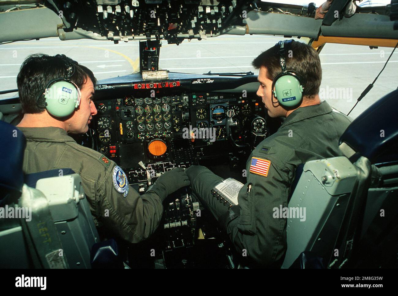 Pilot MAJ Bob Aboe and co-pilot 1LT John Burda of the 2nd Airborne ...
