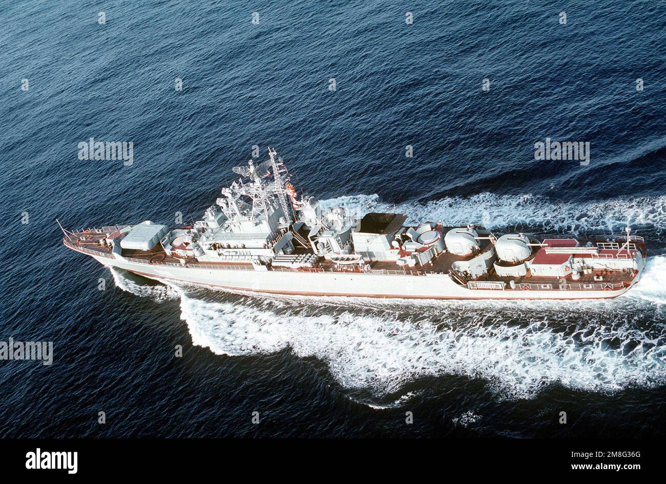 An aerial port view of the Soviet Krivak II class guided missile ...
