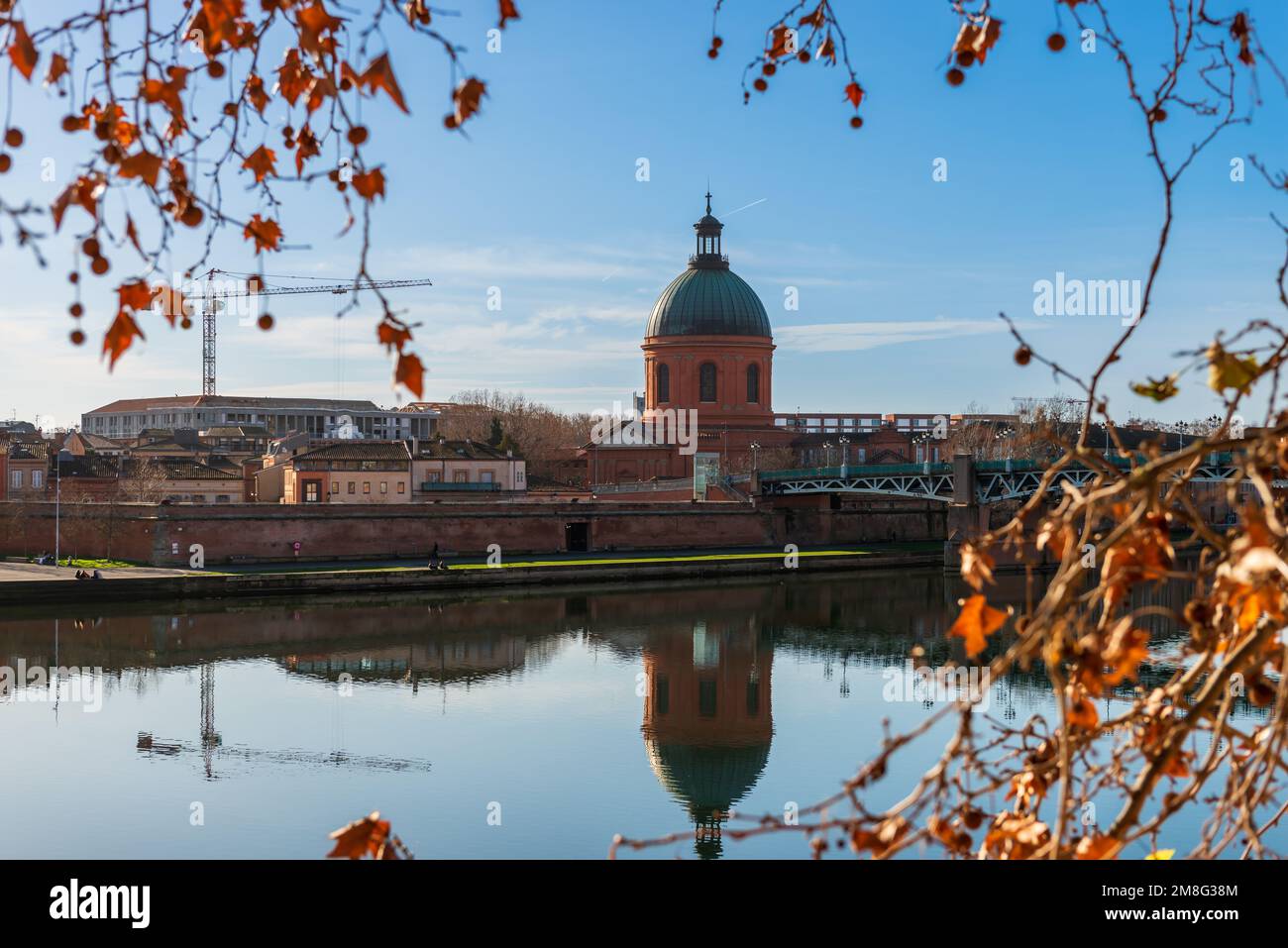 Grave Hospital and its reflection on the Garonne river, in Toulouse ...