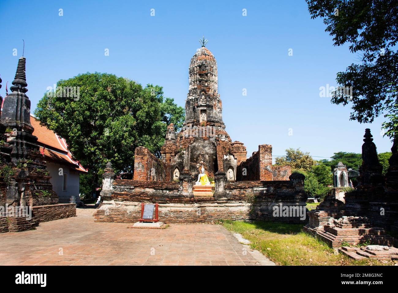 Ancient antique buddha statue and ruins old chedi stupa for thai people ...