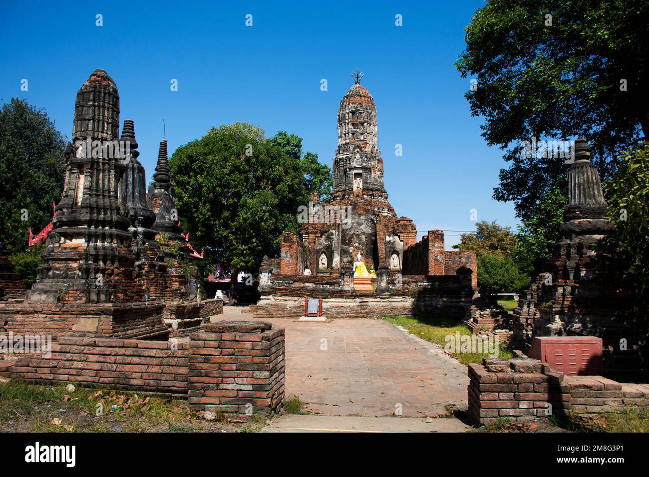 Ancient antique buddha statue and ruins old chedi stupa for thai people ...