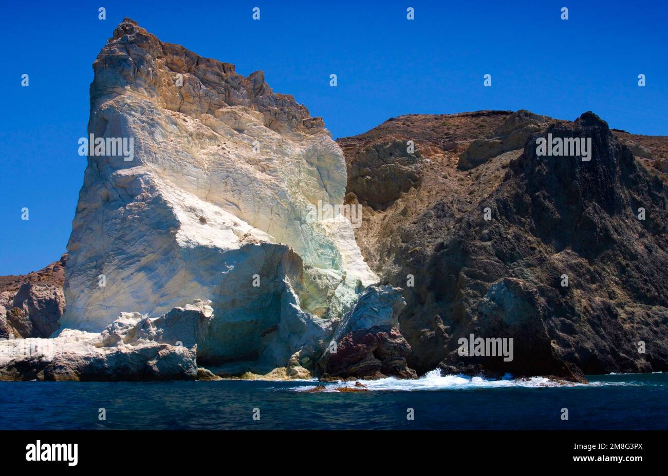 White beach and cliff on the island of Santorini in the Aegean Sea in ...