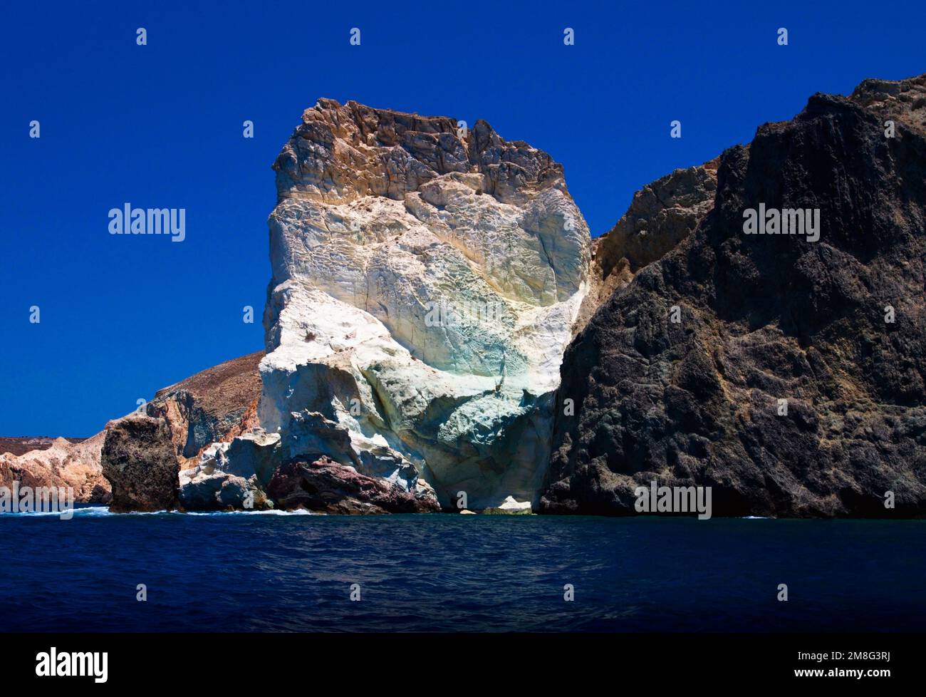 White beach and cliff on the island of Santorini in the Aegean Sea in ...