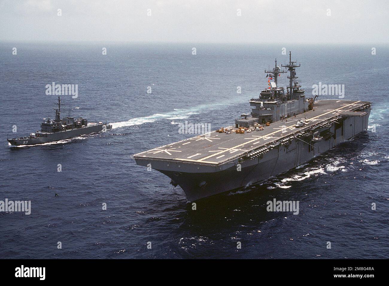 The Colombian frigate ANTIOQUIA (F-53) escorts the amphibious transport ...