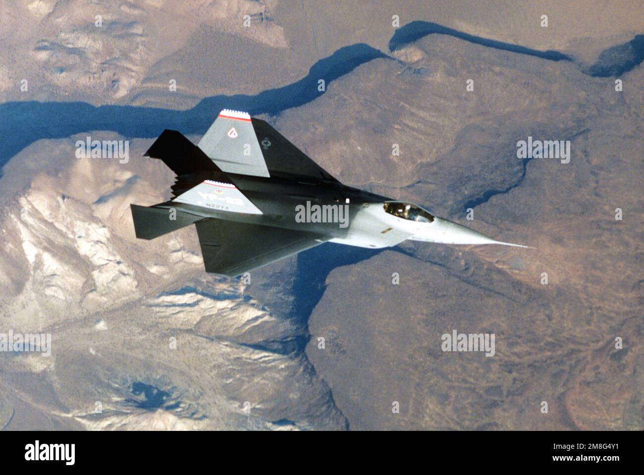 An air-to-air overhead view of the YF-22 advanced tactical fighter ...