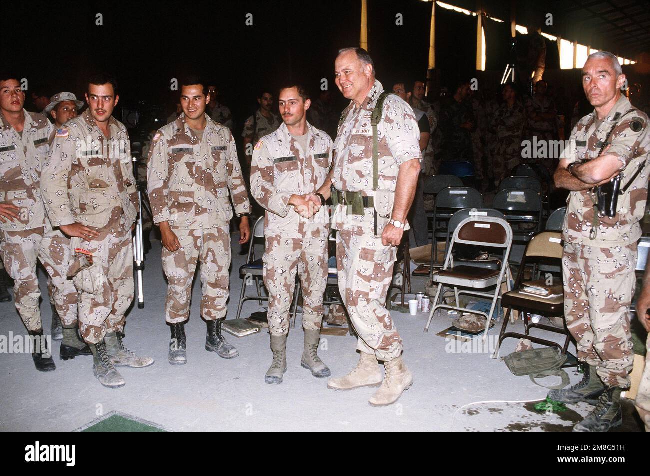 Soldiers of the 24th Infantry Division (Mechanized) line up for a photo ...