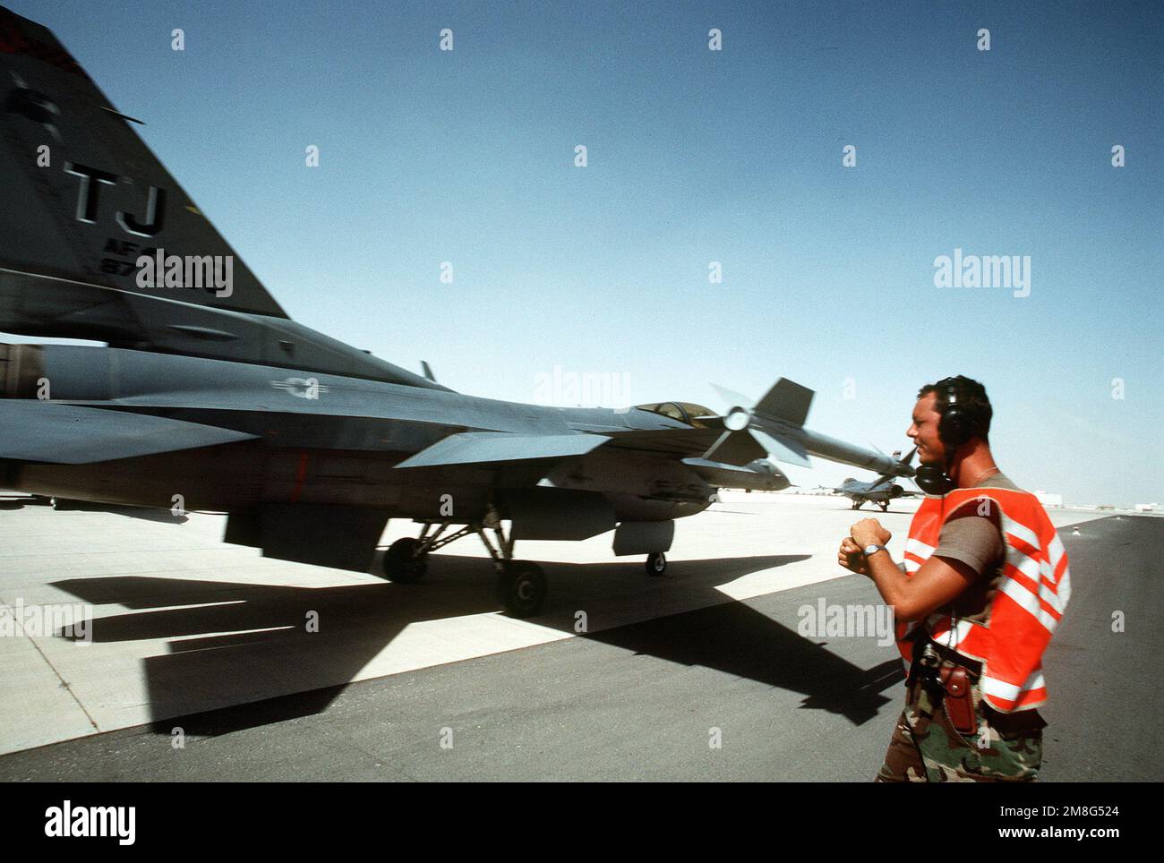 TECH. SGT. Mike Hare watches as a 401st Tactical Fighter Wing F-16C ...