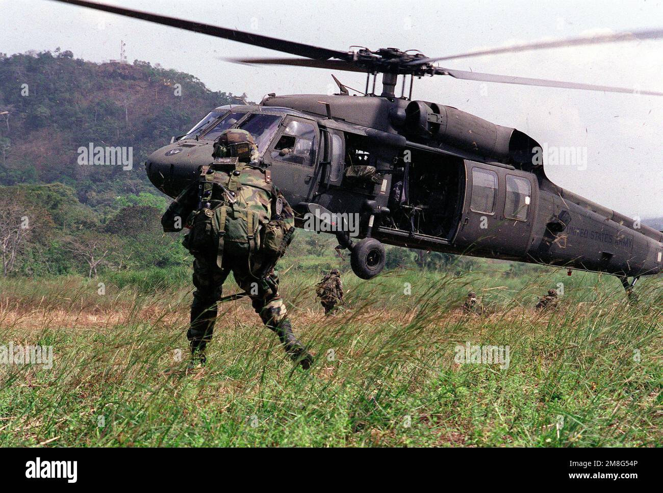 A soldier of the 1ST Battalion, 508th Infantry (Airborne), stands by as ...