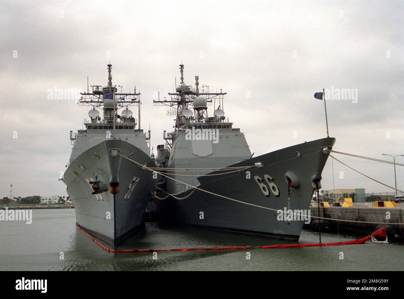 The guided missile cruisers USS PHILIPPINE SEA (CG-58), left, and USS ...
