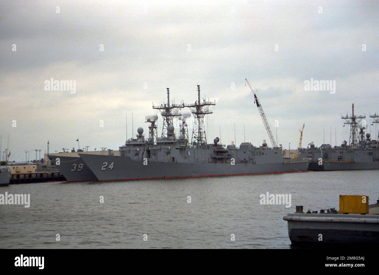 The guided missile frigates USS DOYLE (FFG-39), left, and USS JACK ...