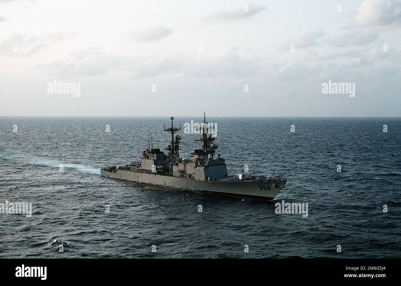 The destroyer USS ARTHUR W. RADFORD (DD-968) sails off the coast of ...