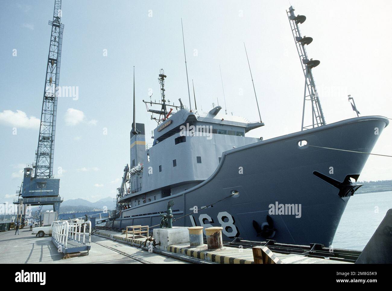 The fleet ocean tug USNS CATAWBA (T-ATF 168) rests alongside a pier next to a crane at the Ship ...