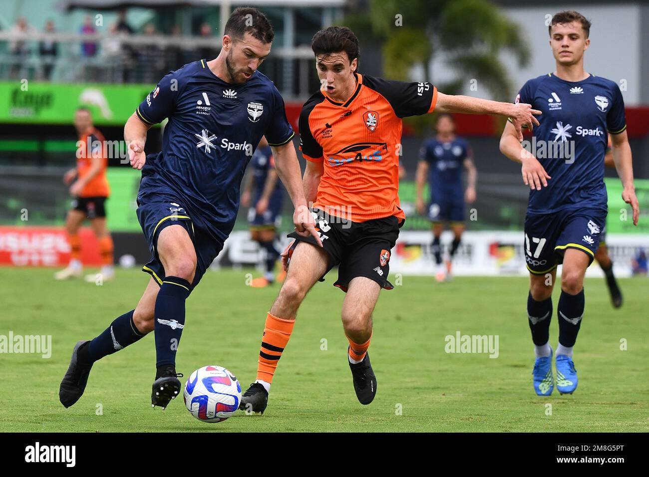 Timothy Payne of the Phoenix competes with Henry Hore of the Roar ...