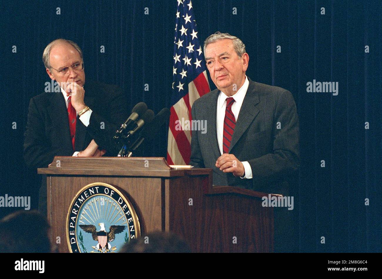 US Secretary of Defense Richard B. Cheney (left), looks on as Deputy ...