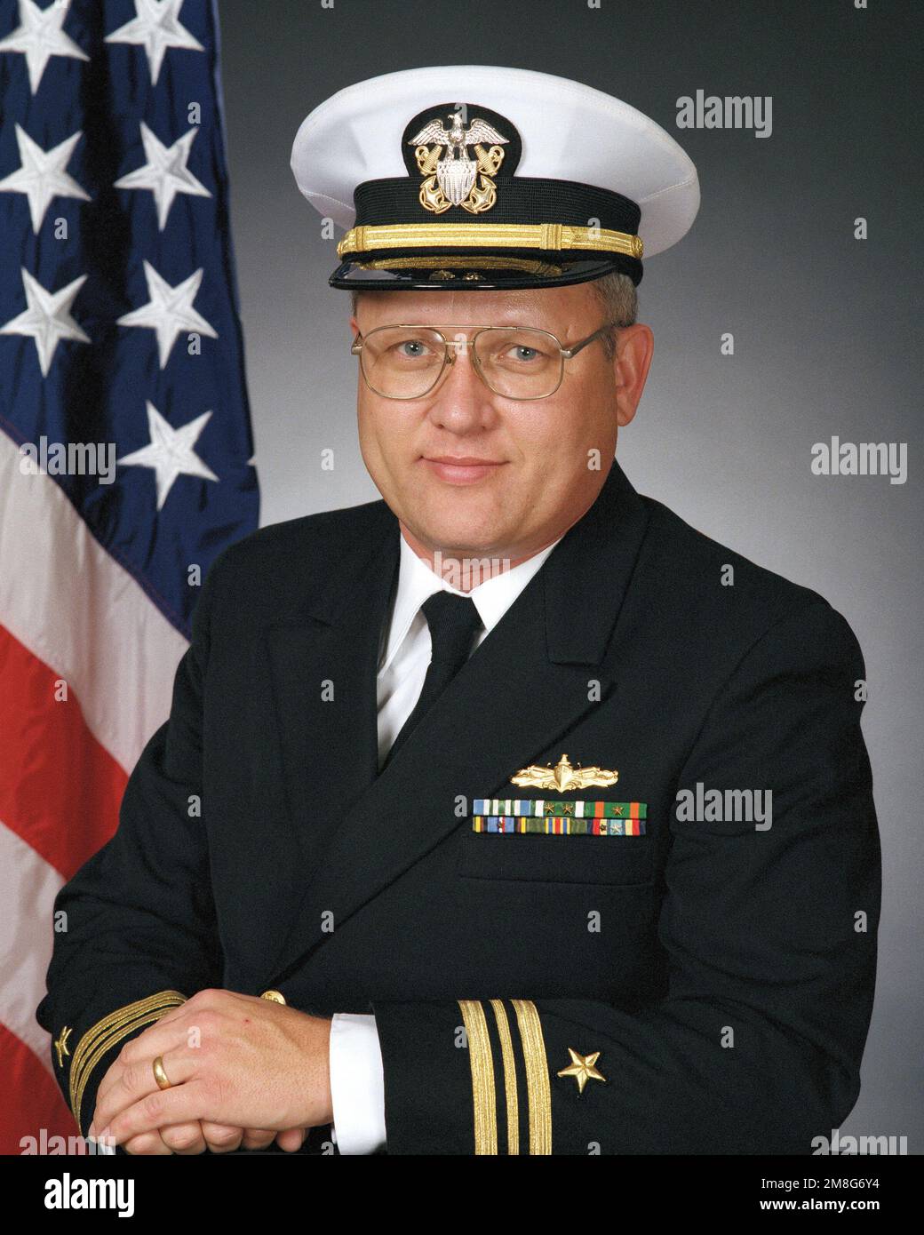 Lieutenant Commander William C. Fosseen, USN (covered). Country ...
