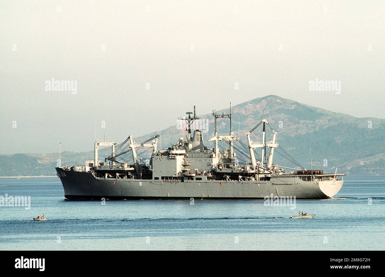 A port quarter view of the amphibious cargo ship USS DURHAM (LKA-114 ...