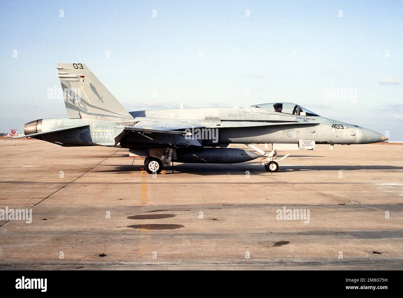A right side view of a Strike Fighter Squadron 147 (VFA-147) F/A-18C ...