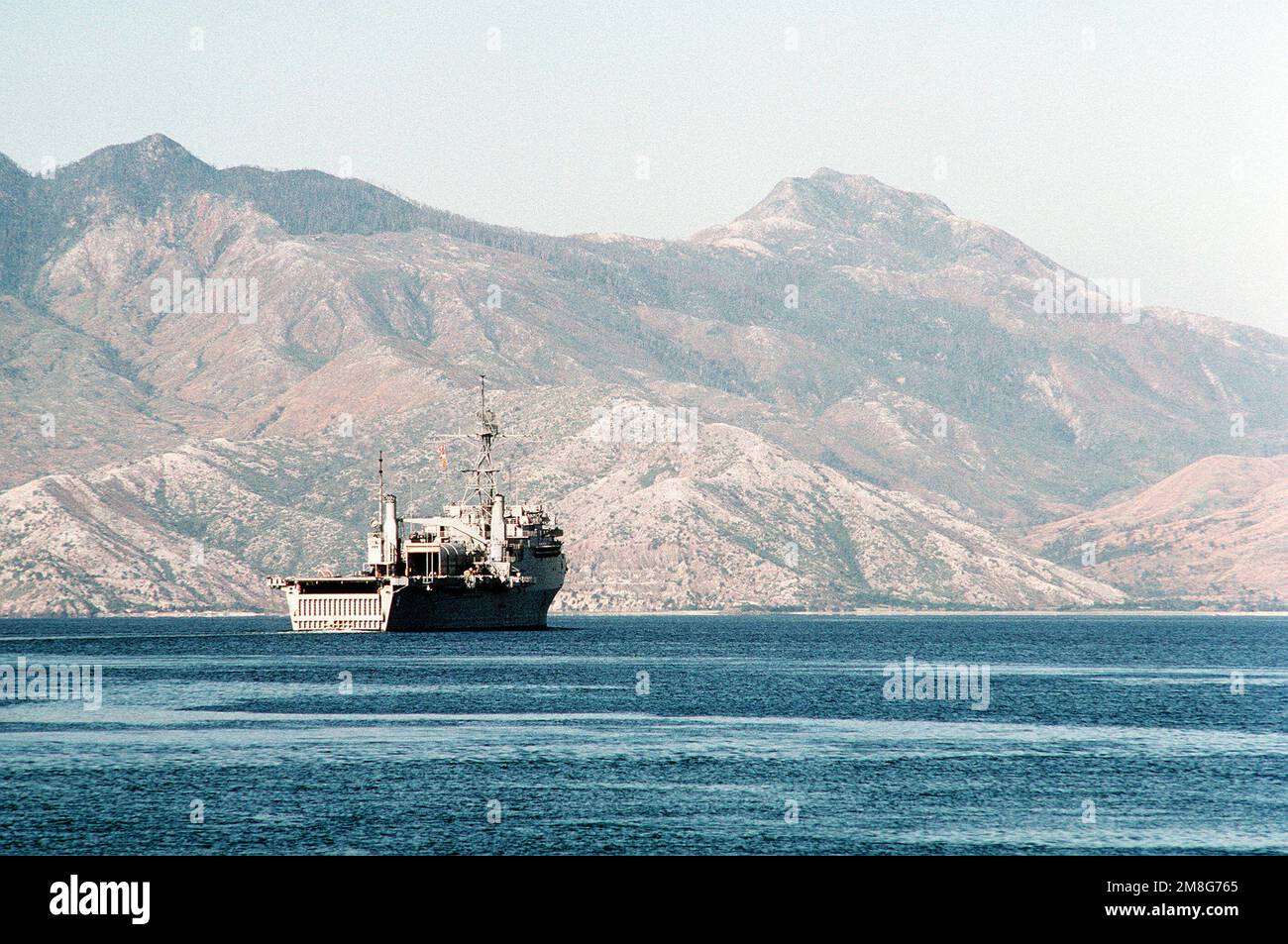 A starboard quarter view of the amphibious transport dock USS DUBUQUE ...