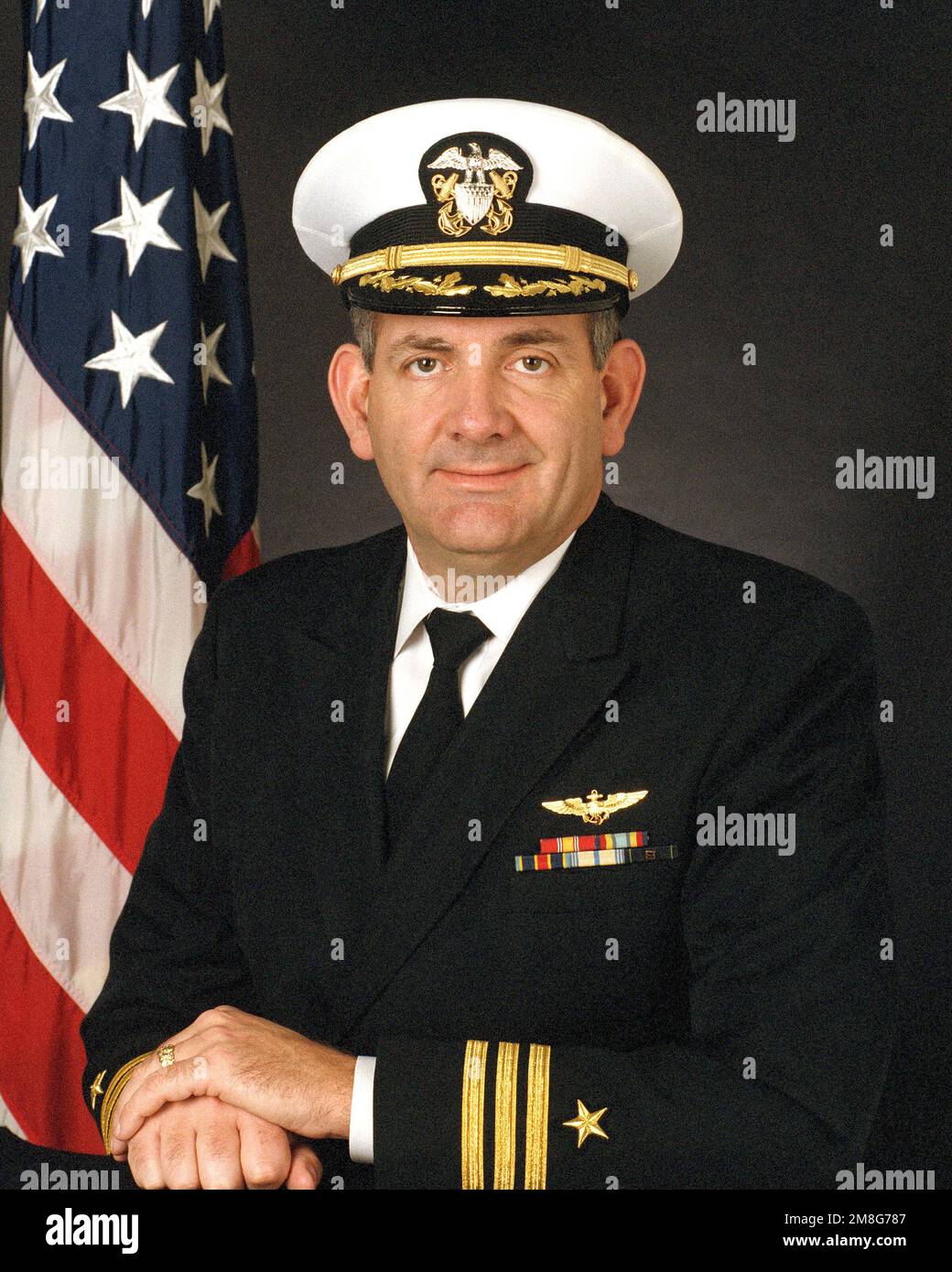 Commander Daniel A. Crawford, USNR (covered). Country: Unknown Stock ...
