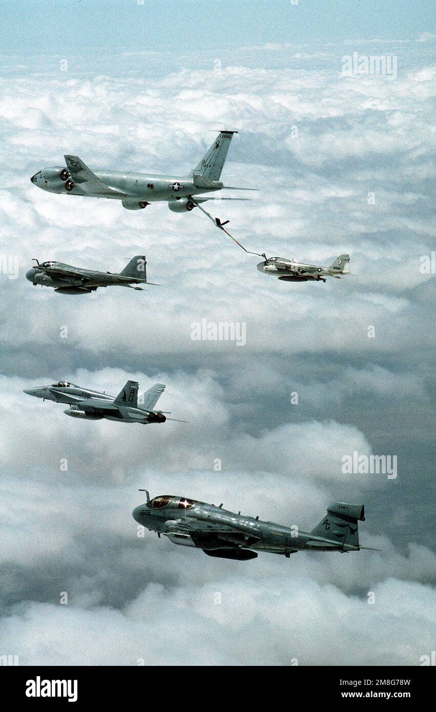 From top to bottom, a U.S. Air Force KC-135R Stratotanker refueling a ...