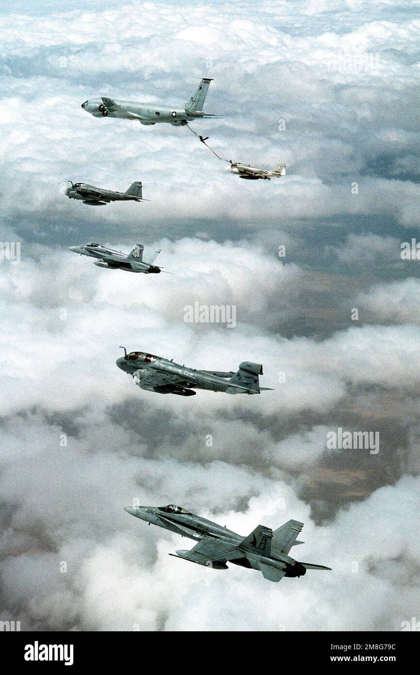 From top to bottom, a U.S. Air Force KC-135R Stratotanker refueling a ...