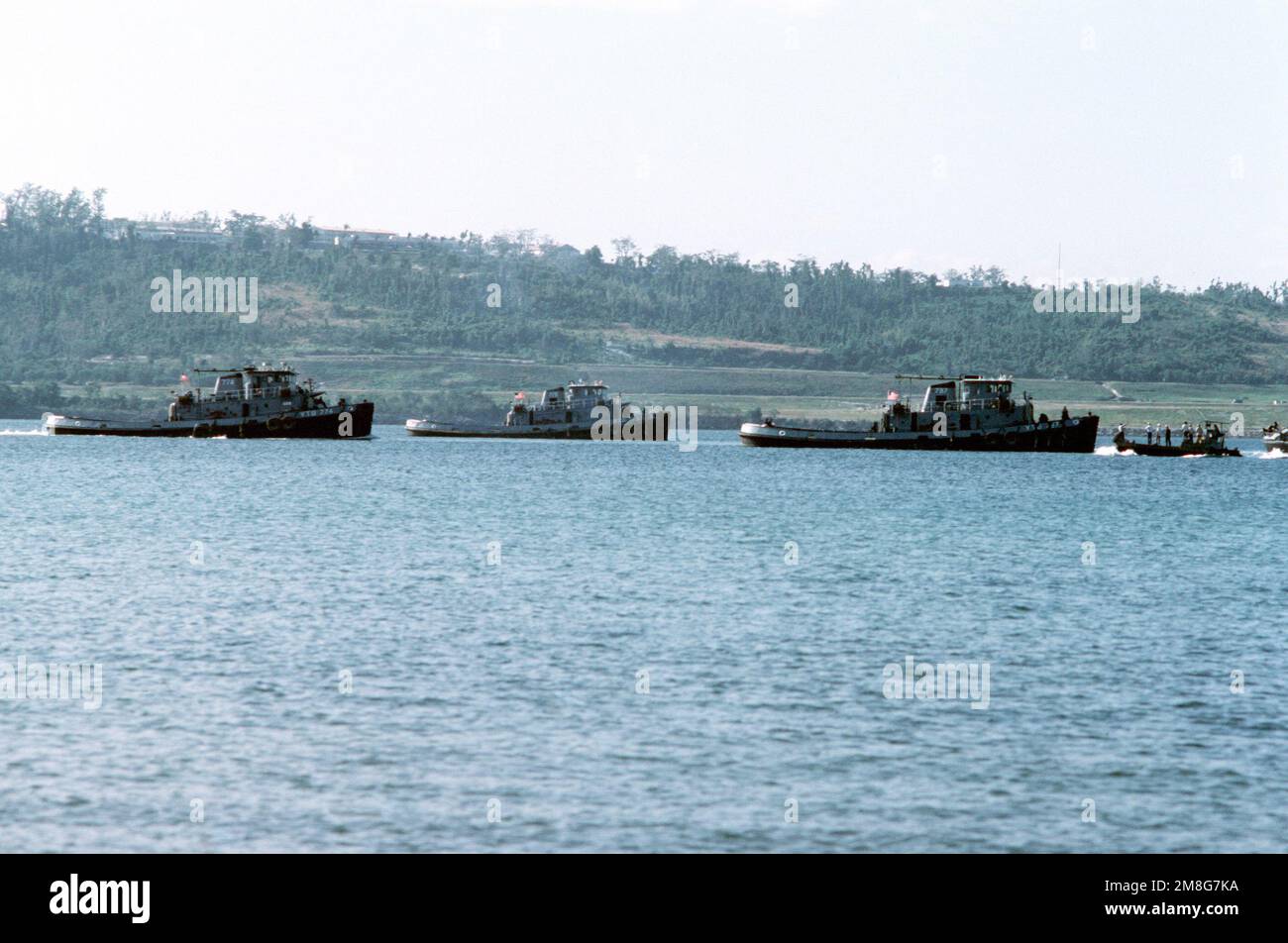 The large harbor tugs KITTANNING (YTB-787), WAUWATOSA (YTB-775) and ...