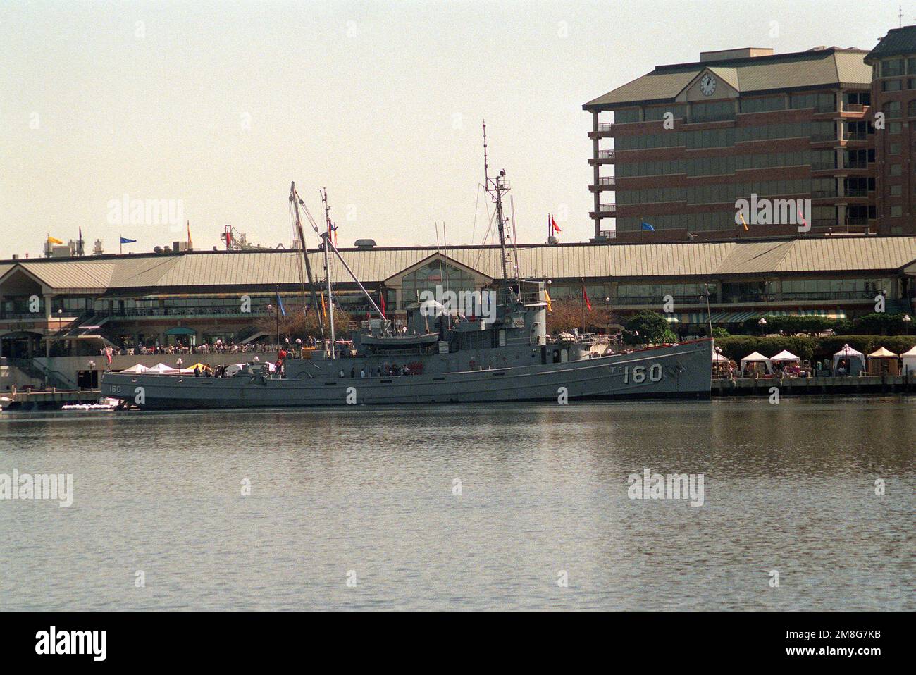 A starboard beam view of the fleet tug USS PAPAGO (ATF 160) docked in ...