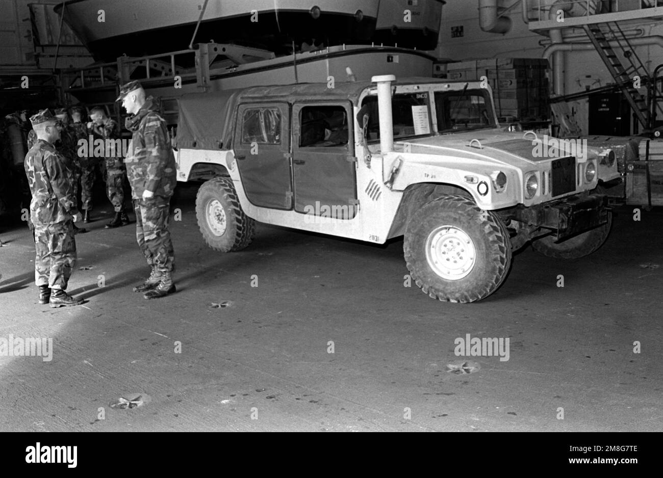An M998 High-Mobility Multipurpose Wheeled Vehicle (HMMWV) is prepared ...