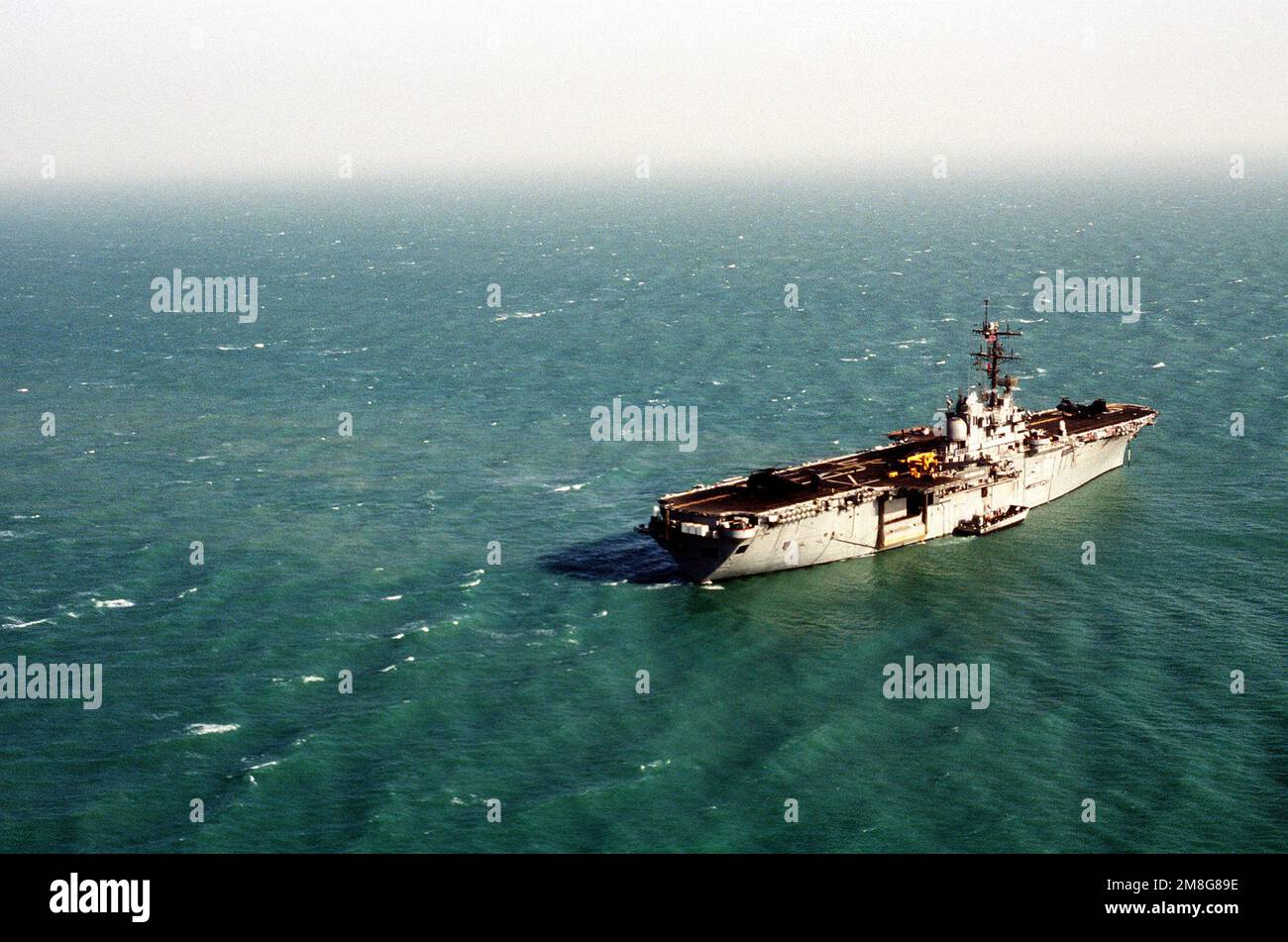 A starboard quarter view of the amphibious assault ship USS OKINAWA ...