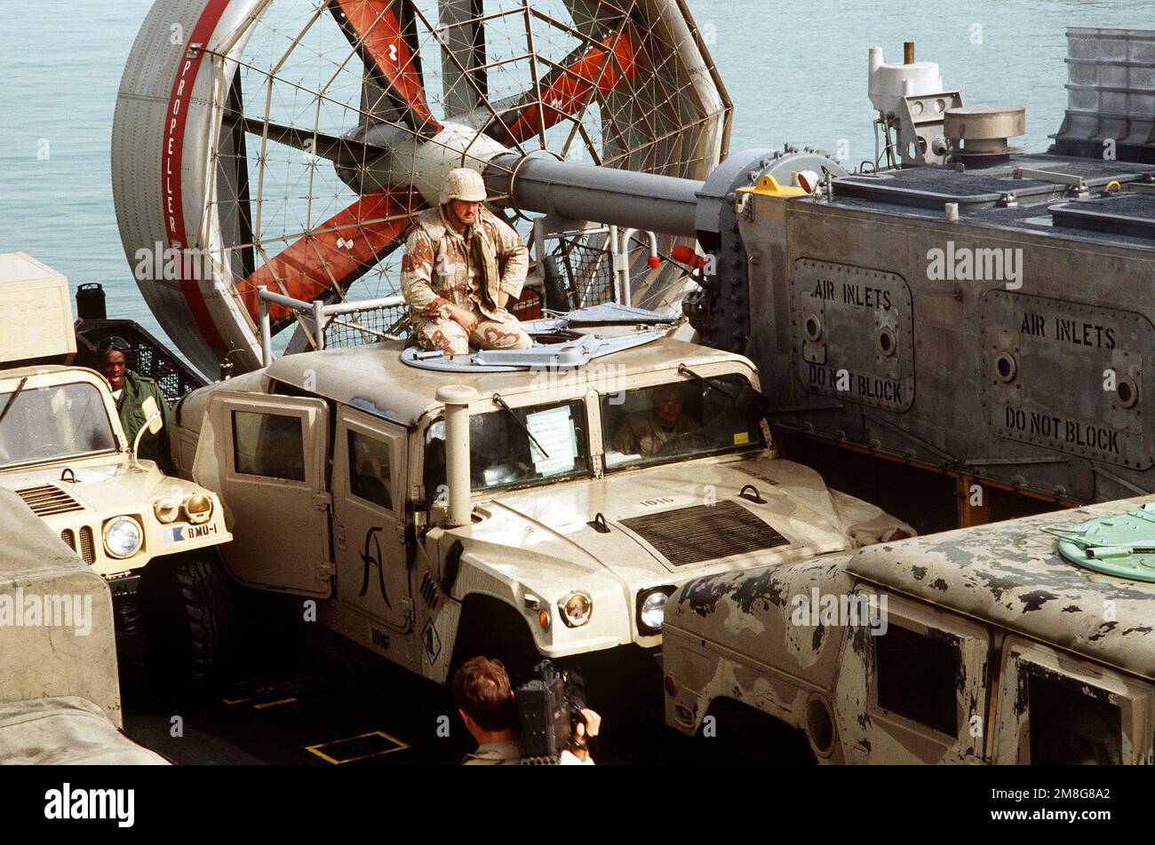 M-998 mobility multi-purpose wheeled vehicles and other equipment are ...