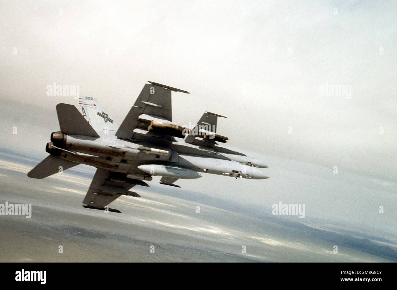 A pair of F/A-18C Hornet aircraft from Strike Fighter Squadron 105 (VFA ...