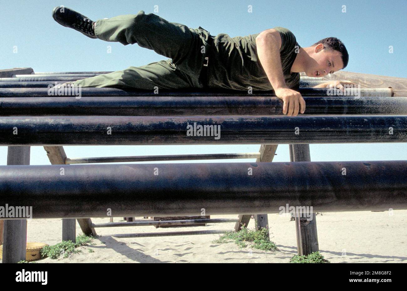 A member of Basic Underwater Demolition/Sea-Air-Land (BUD/S) Class 183 ...