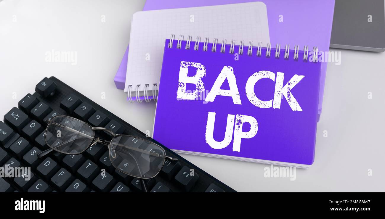 Text sign showing Back Up, Business overview saving important data into ...
