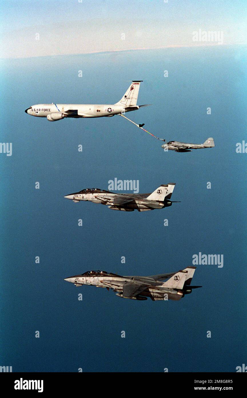 A KC-135R Stratotanker aircraft refuels an A-6E Intruder aircraft as ...