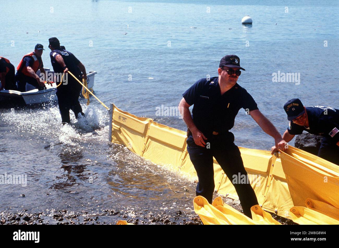 Members of the Coast Guard Marine Safet6y Office, Honolulu, set up an ...