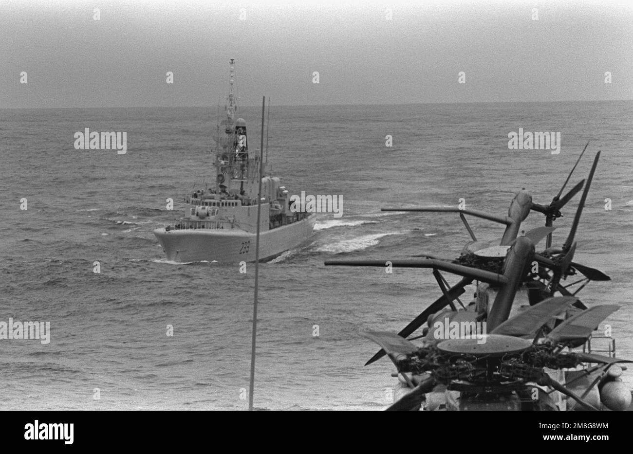 The Canadian frigate HMCS FRASER (DDE-223) maintains station off the ...