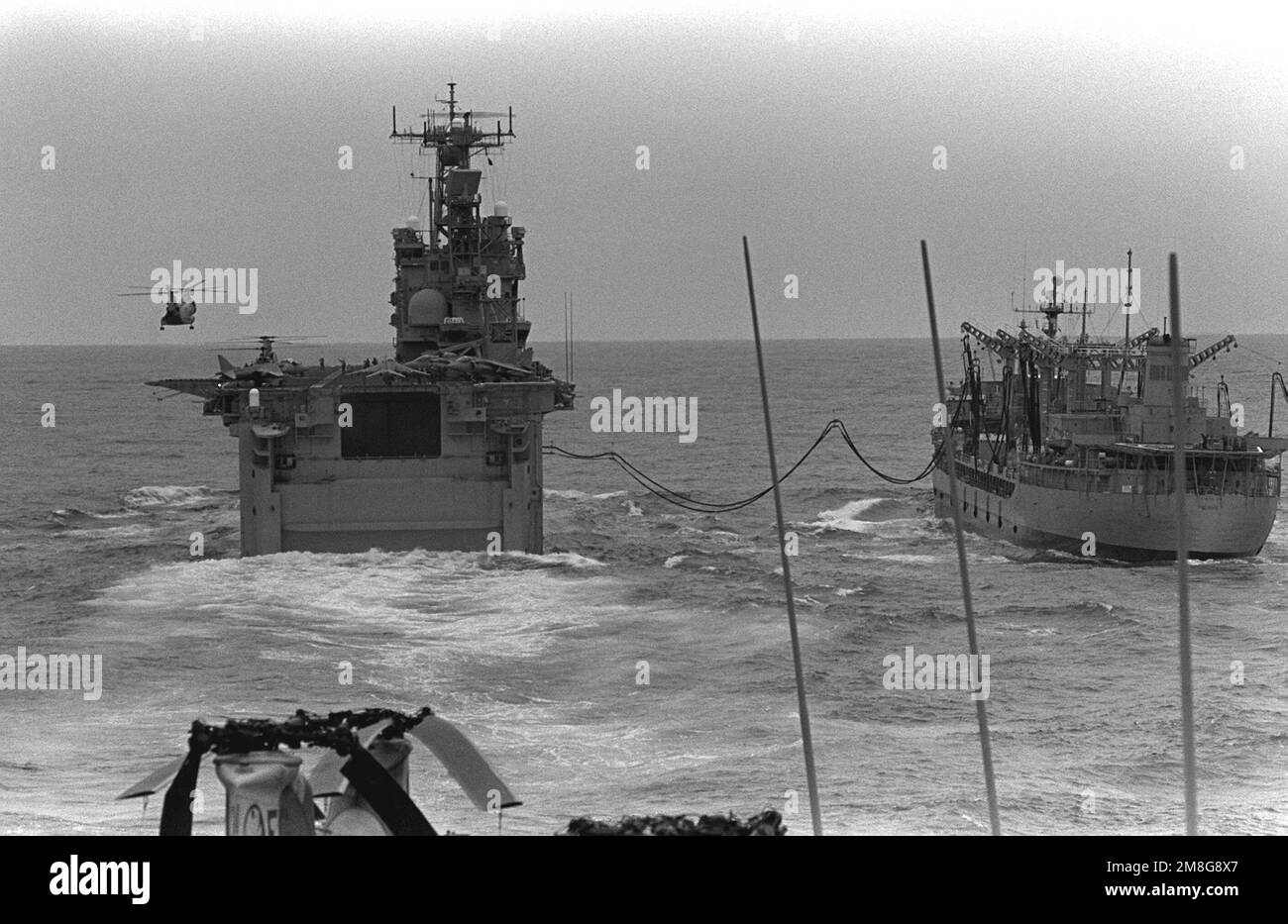 As seen from the bow of the amphibious assault ship USS GUADALCANAL ...