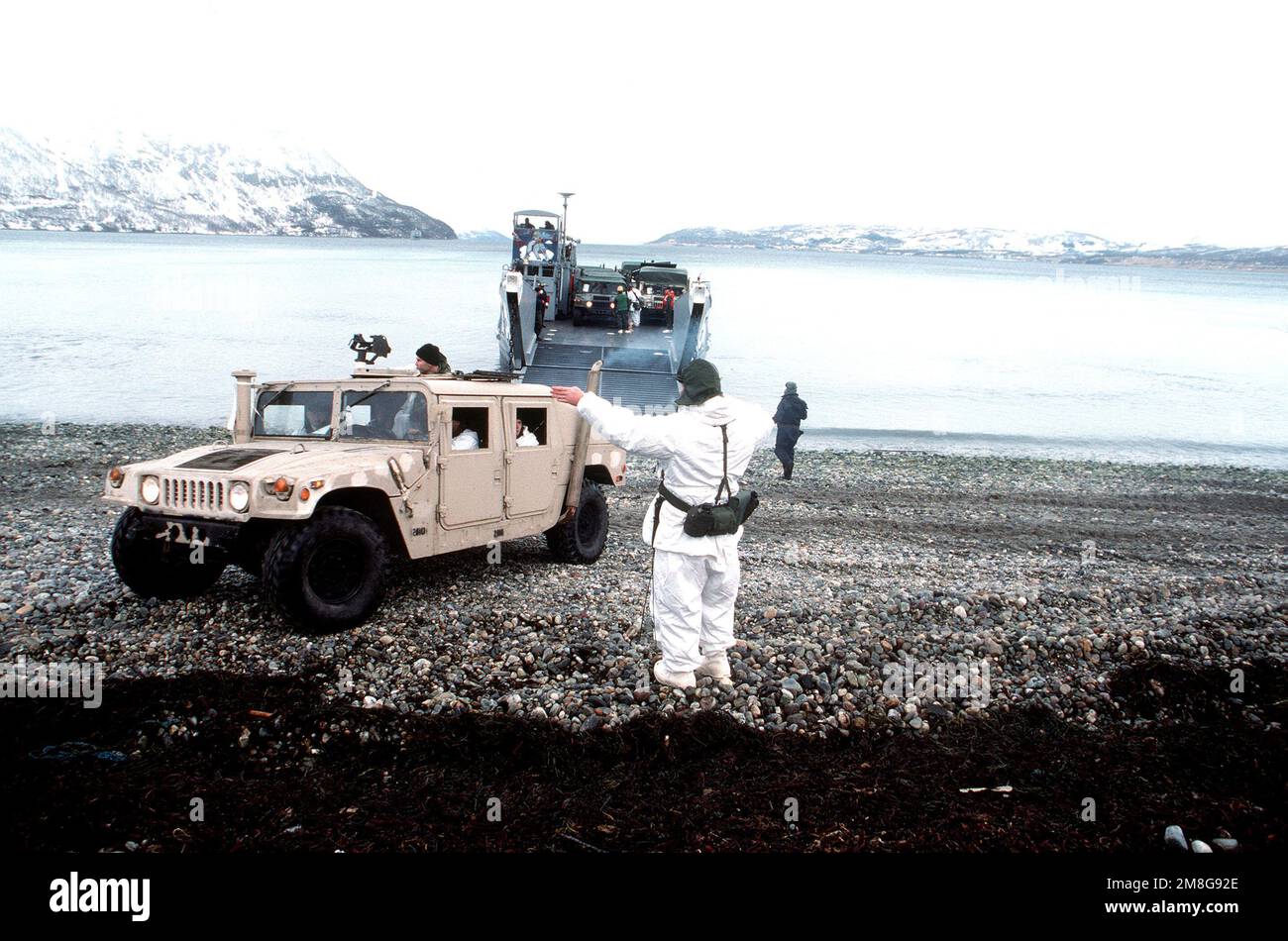 A U.S. Marine M-998 high-mobility, multipurpose, wheeled vehicle is ...