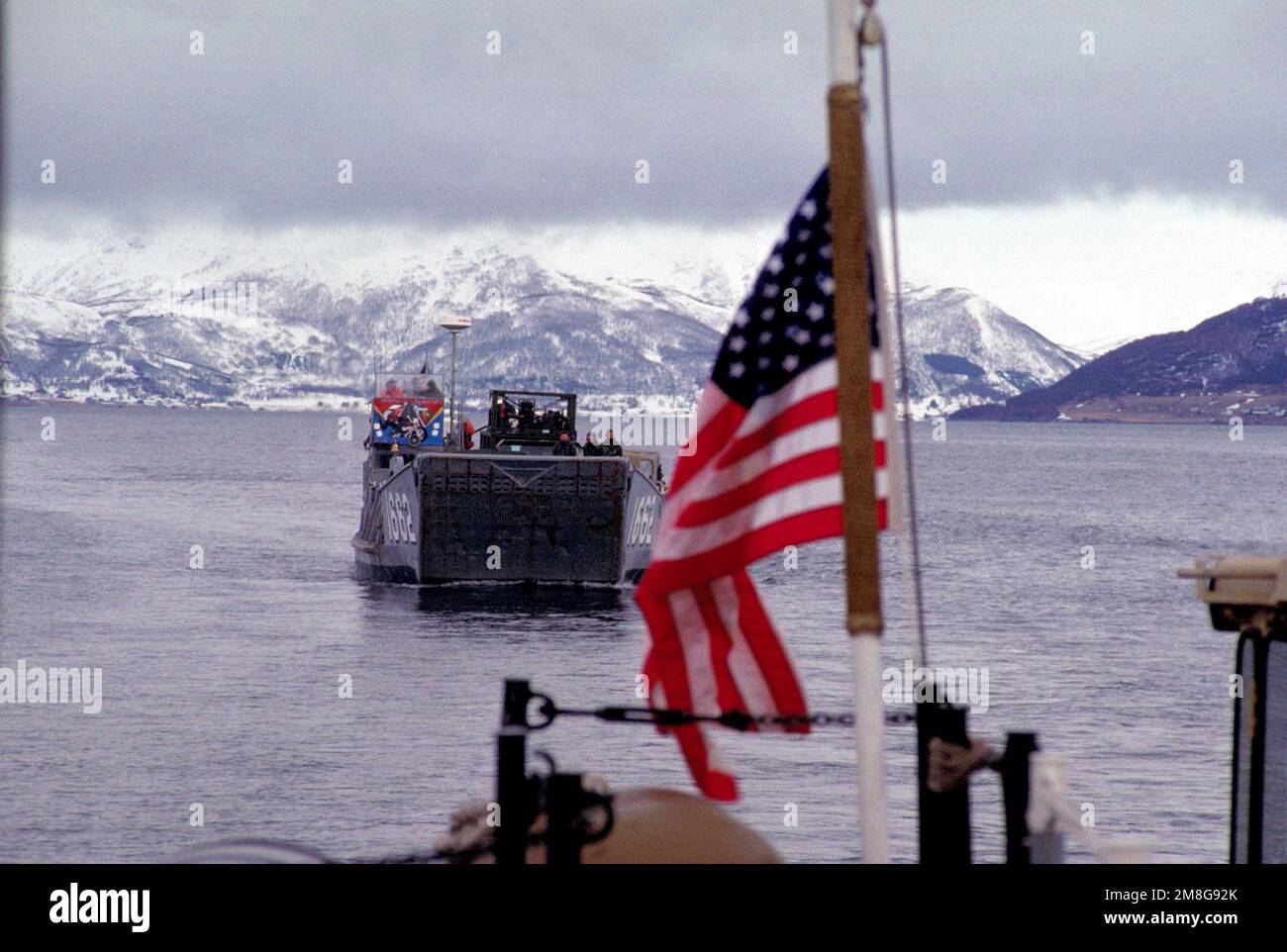 The utility landing craft LCU-1662 approaches the well deck of the ...